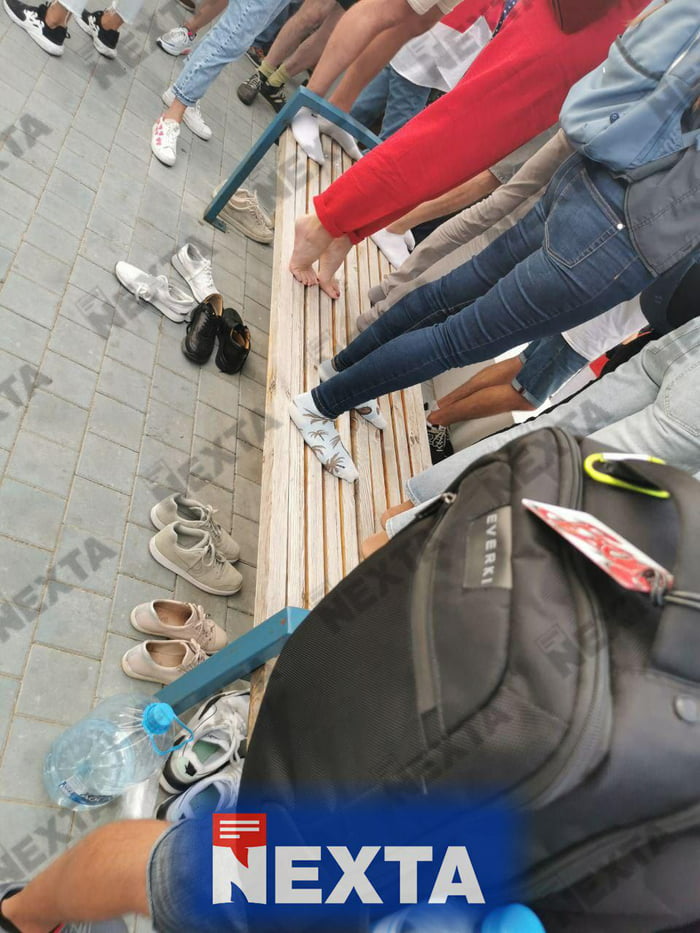 Belarus protests. People are taking off their shoes to stand on the ...