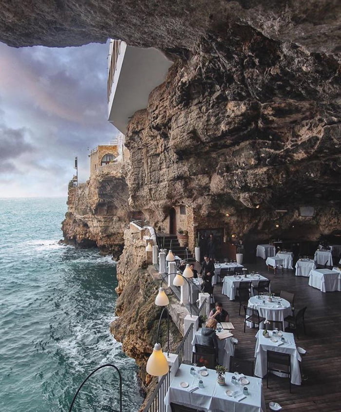 This seaside restaurant in Italy that’s been built into the cliff - 9GAG