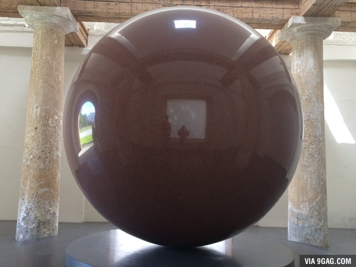 A smooth granite sphere with a diameter of 20ft - 9GAG