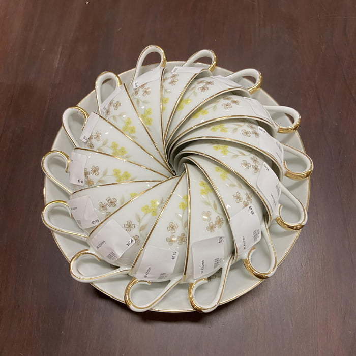 The way these thrift store tea cups are displayed - 9GAG