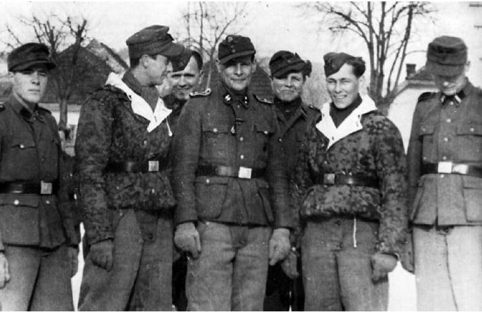 Group of Ukrainian SS soldiers along with a German counterpart (center ...