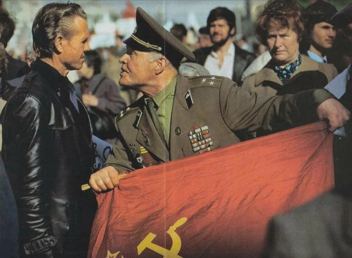 World War 2 Red Army veteran waving a Soviet flag and confronting an ...