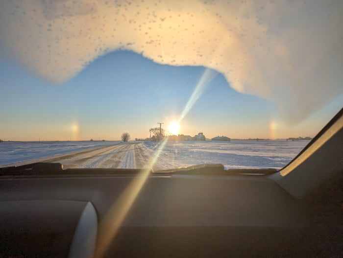 Saw some solar parhelia today! The wind-chill is in the -30s - 9GAG