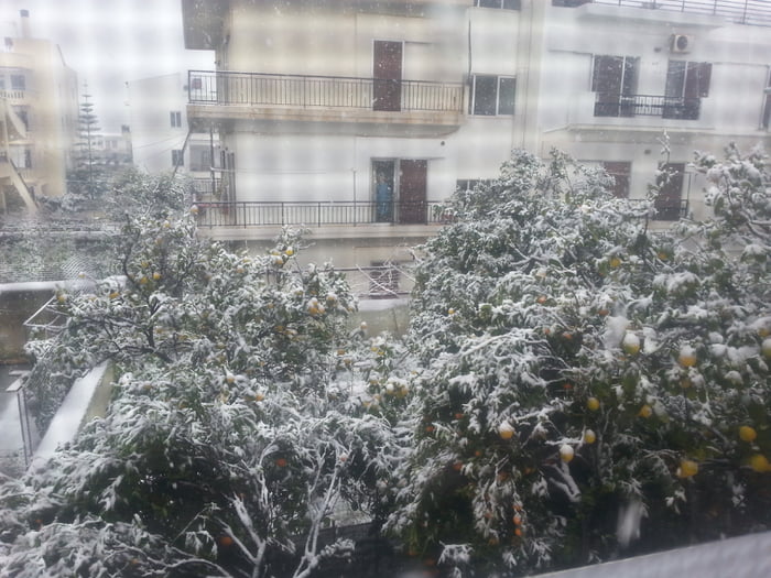 First time that I see snow in my city greece,crete,chania - 9GAG