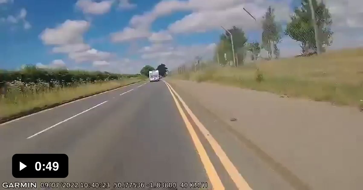 Fight Club: Car (towing caravan) versus cyclist. - 9GAG