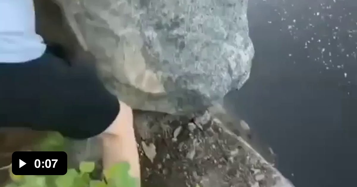 Pushing boulder into the water - 9GAG