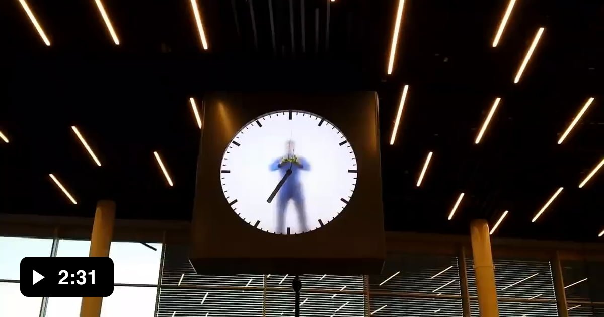 This clock at the Schiphol Airport in Amsterdam looks like it has a ...
