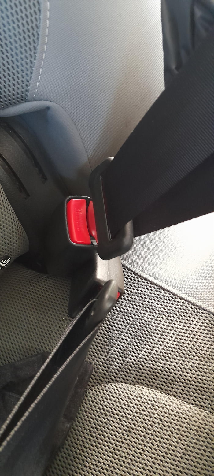 Car seat belt only accepts belts from the opposite sides. - 9GAG