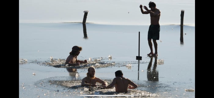 Dutch guys playing chess in ice hole - 9GAG