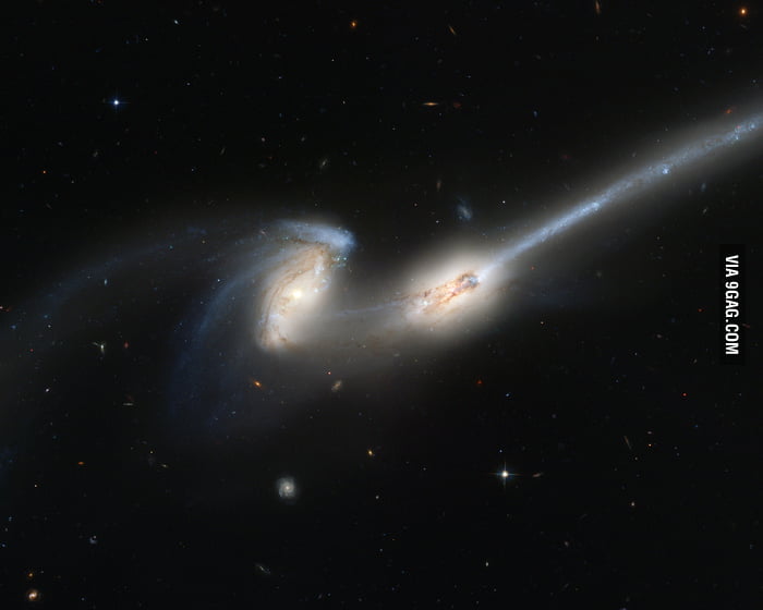 Hubble takes a deep look at two merging galaxies. - 9GAG