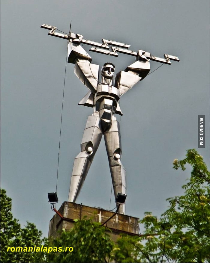 Romania's Iron Man, a 10 m. high statue of Prometheus. Near Vidraru Dam ...