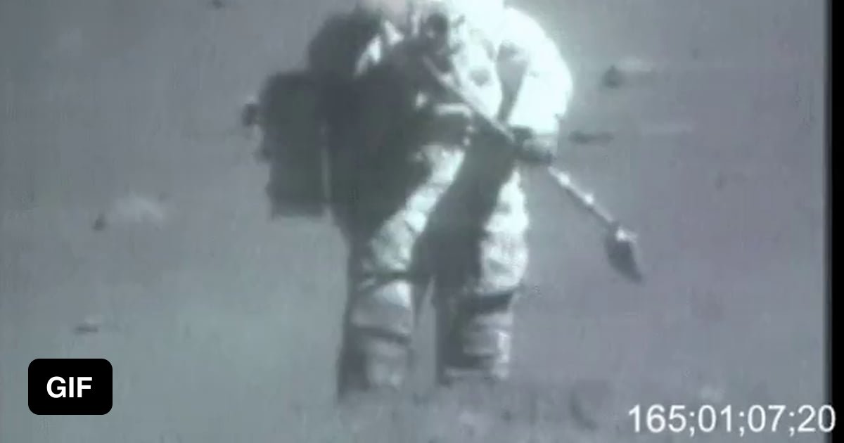 A rare moment where you can see Apollo 17 astronaut Jack Schmidt's face behind the visor - 9GAG