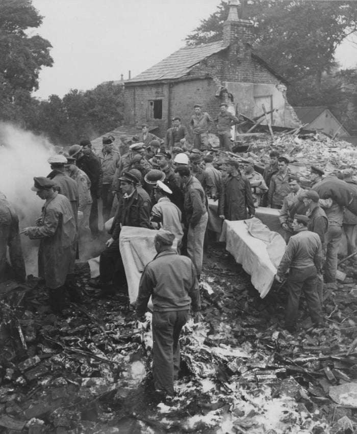 Rescuers at the site of the Freckleton air disaster that left 61 dead ...