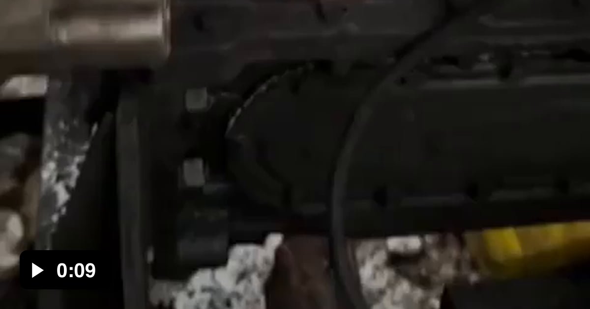 Engine with a hole in the block and the crankshaft and conrod glowing ...