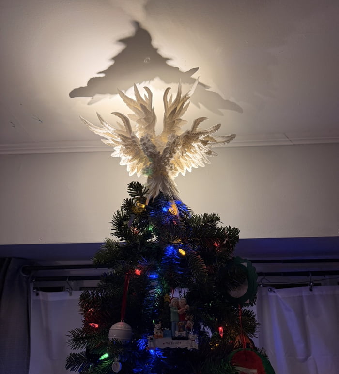 Biblically accurate angel for my christmas tree topper. I put a couple ...