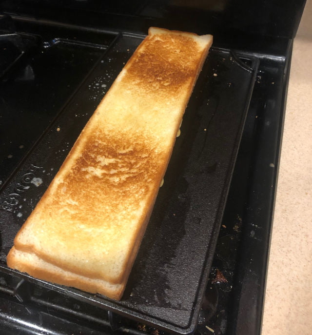 Man Uses Bread Loaf Cut Lengthwise To Make Extra Long Grilled Cheese - 9GAG