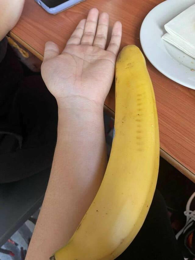 Banana, arm for scale - 9GAG