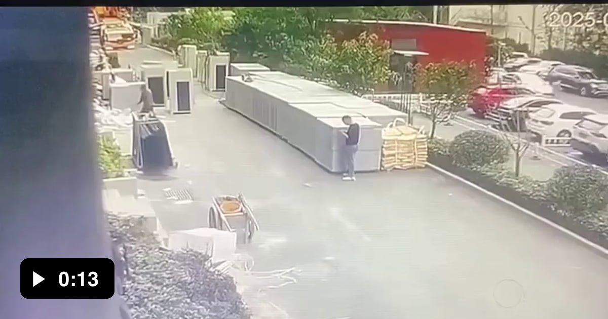 Man is saved from falling crane by concrete blocks - 9GAG