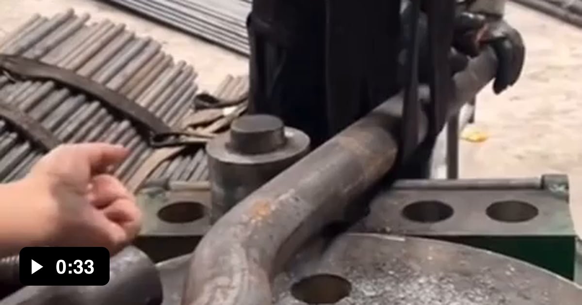 Bending giant steel rod - 9GAG