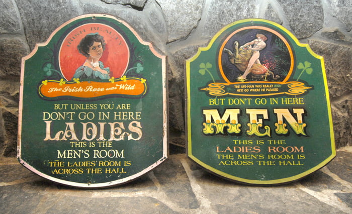 The Irish pub in my small town had these signs on the bathroom doors ...