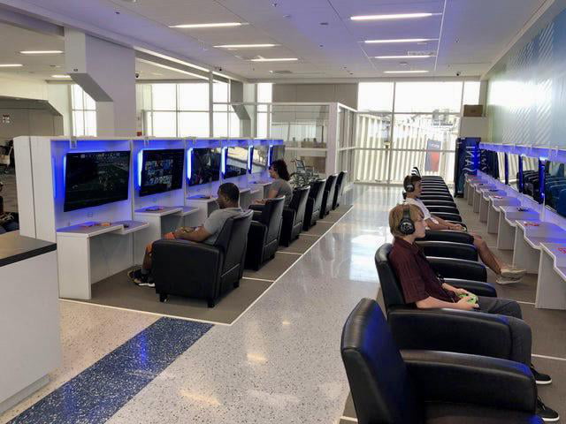 DFW (Dallas/Fort Worth) Airport added a gaming lounge so that you can ...