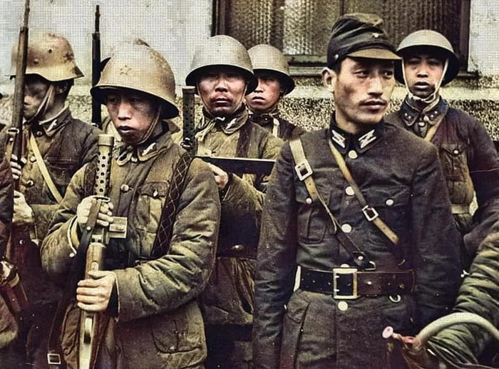 Pro-Japanese Chinese soldiers armed with SIG M1920 “Brevet Bergmann ...