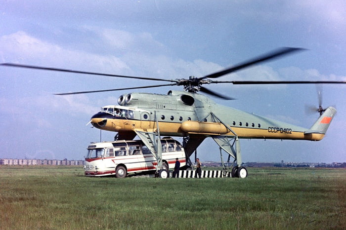 Rare photo of a soviet helicopter raping a small bus - 9GAG