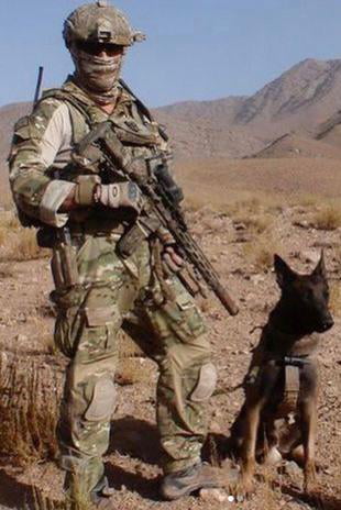 SAS soldier ran through gunfire to save dog shot after it helped kill a ...