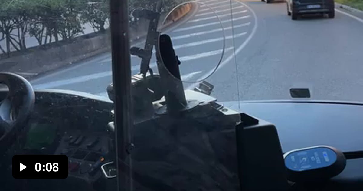 Bus driver reads a magazine every morning with his reading glasses on ...