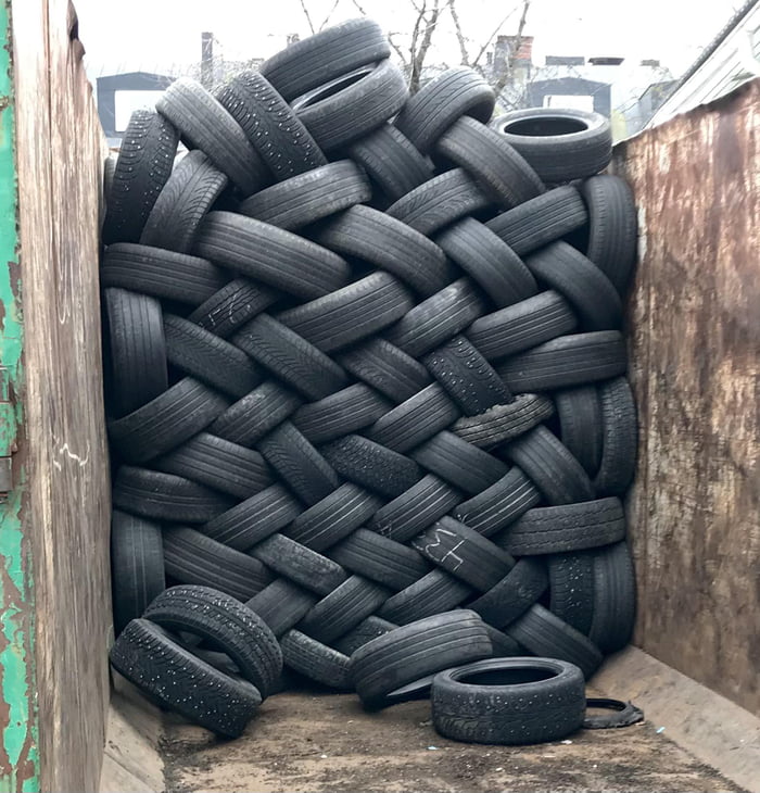 This stack of car tires in the back of the container - 9GAG