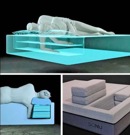 A mattress with built-in arm slots for side sleepers and snugglers ...