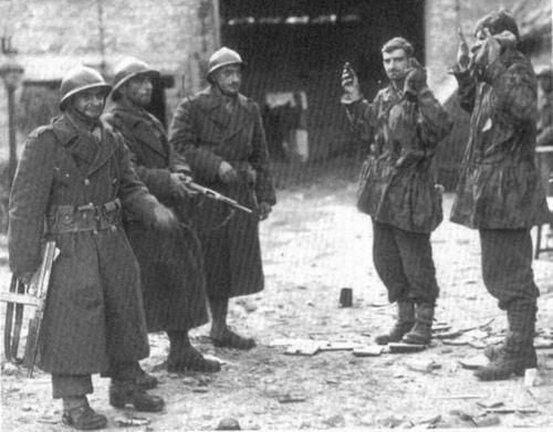 Soldiers of the First French Army with German POWs, 1945 - 9GAG