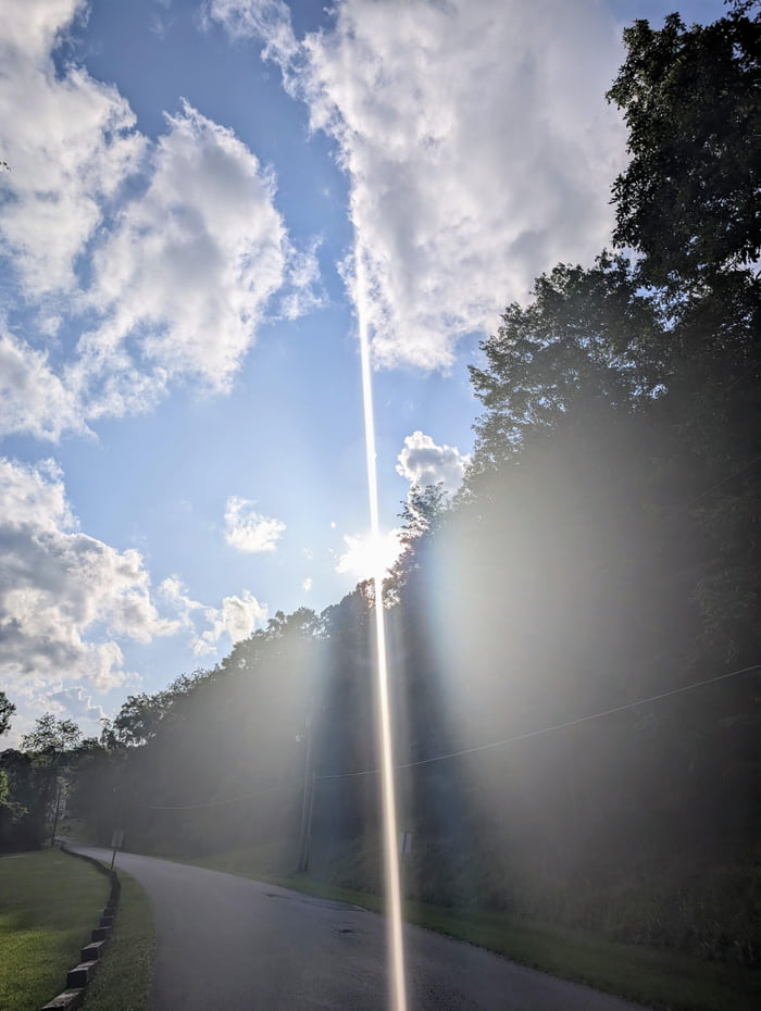 A powerful sunbeam breaking through the clouds - 9GAG