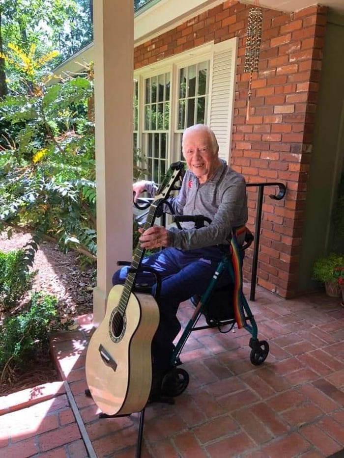 Jimmy Carter with guitar made of rare wood from trees he planted ...
