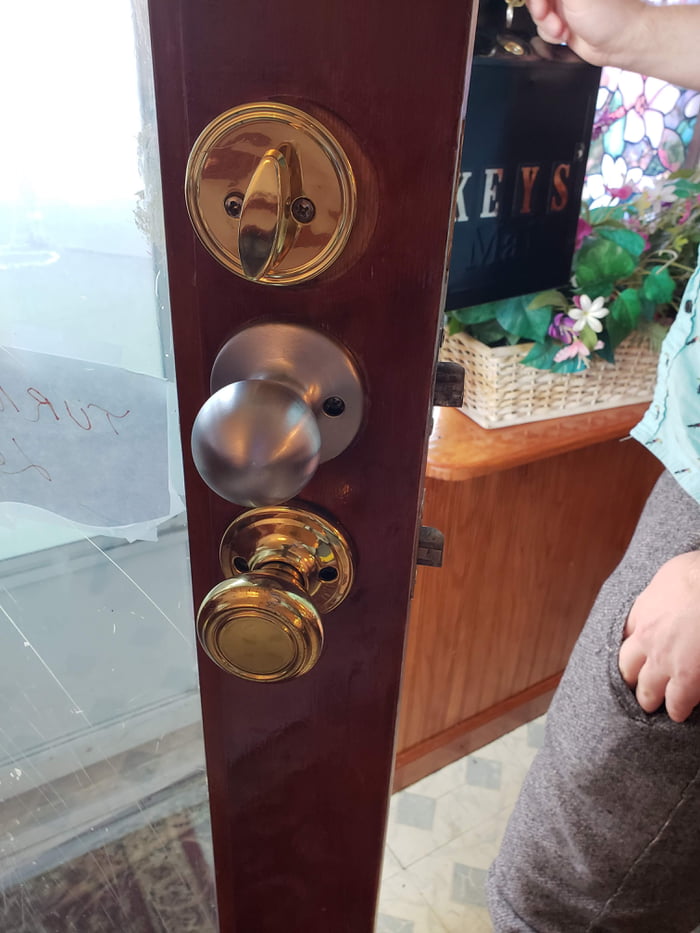 Three doorknobs for maximum security...with a breakable glass pane. - 9GAG