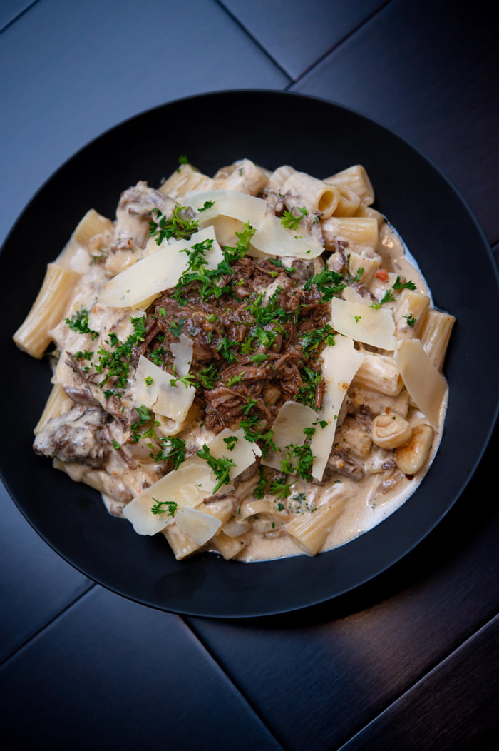 White wine braised seasoned short ribs Parmesan rigatoni. - 9GAG