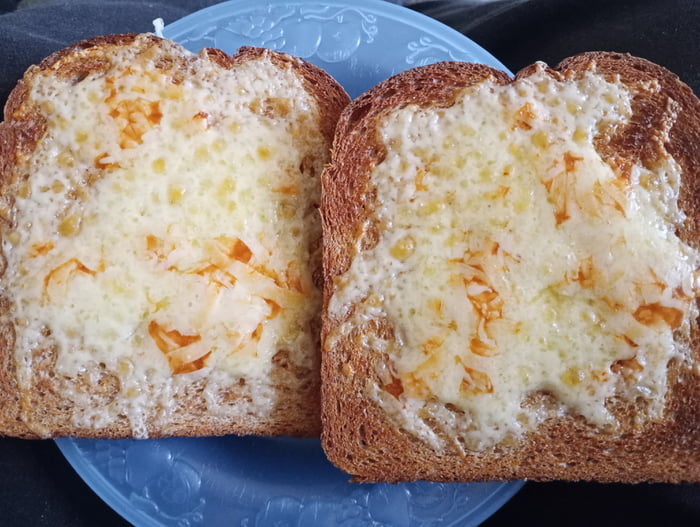 Cheese on toast with a few splashes of hot sauce. Perfect snow day ...