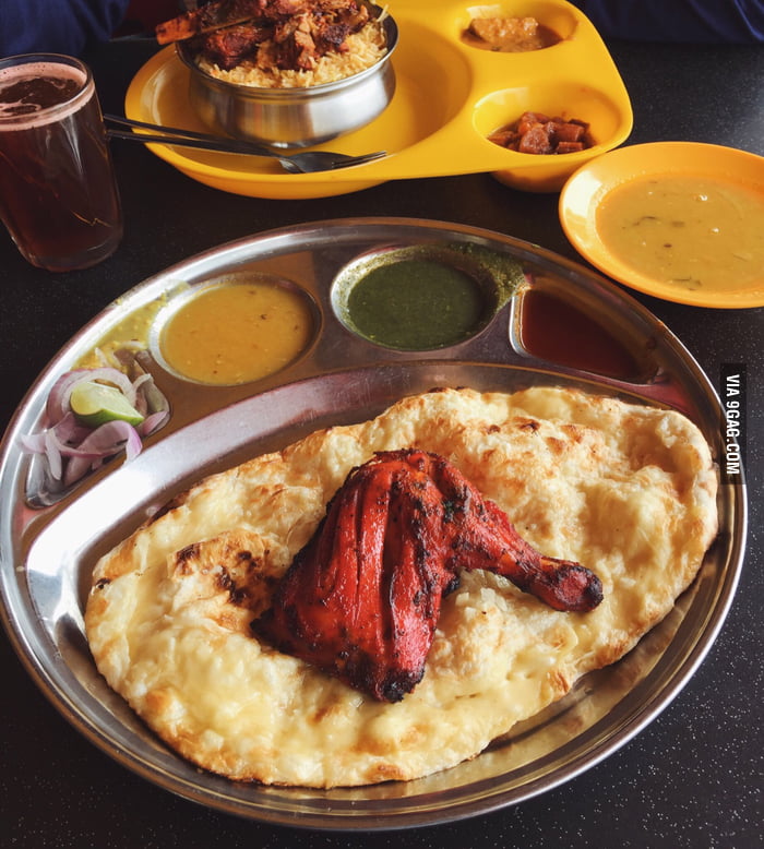 Garlic cheese nan with chicken tandoori. - 9GAG