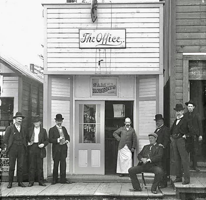 The Bartender and some regulars pose for a photo outside The Office ...