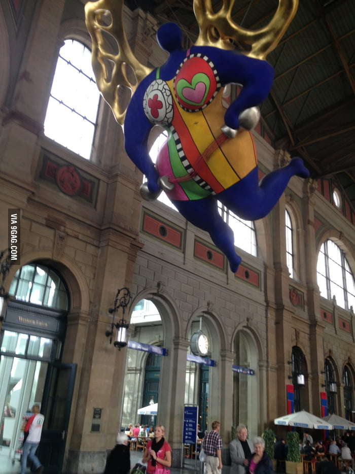 My favourite meetingplace in Zurich. Beneath the fat angel. - 9GAG