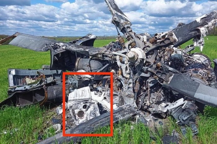Amid the wreckage of Russian attack helicopter is..a washing machine ...