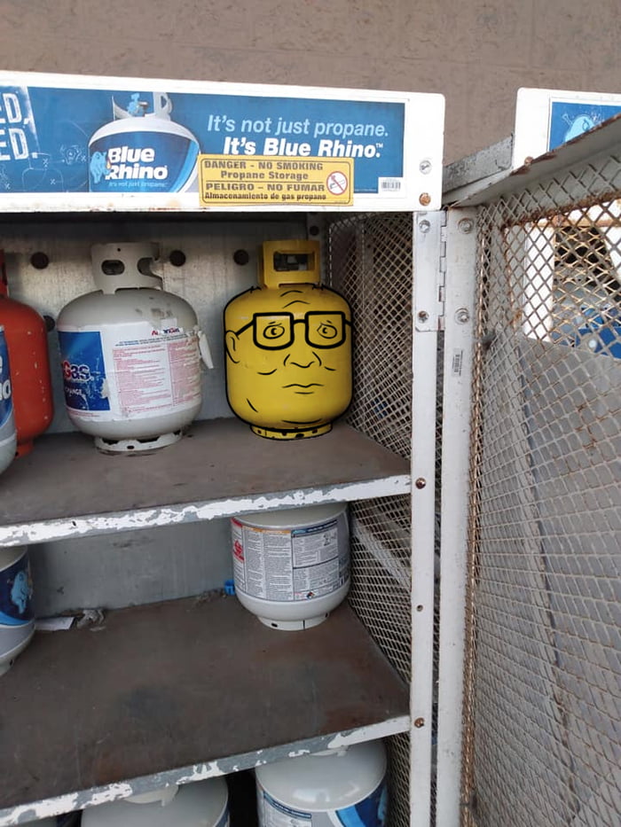 This propane tank painted like Hank Hill's Lego head - 9GAG