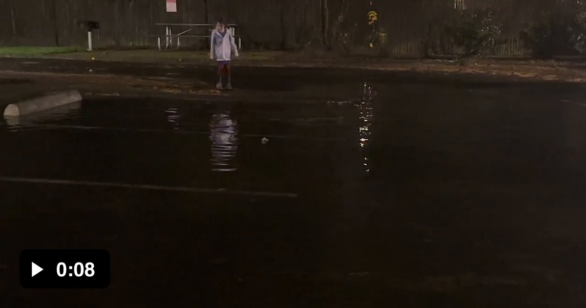 Child runs in puddle, but doesn’t realize how deep it is, Water filled ...