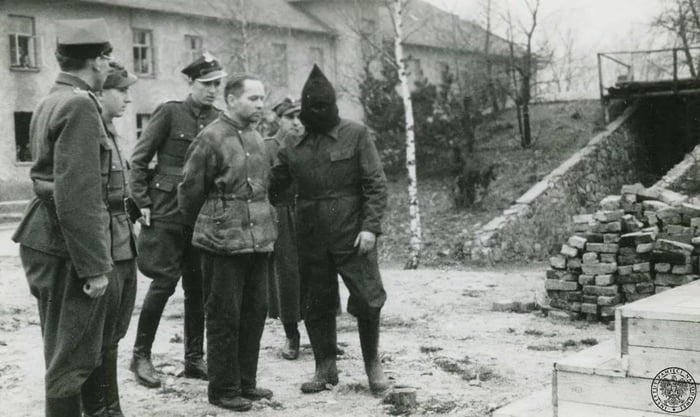 Auschwitz Camp Commandant, Rudolf Hoess walking to his gallows next to ...