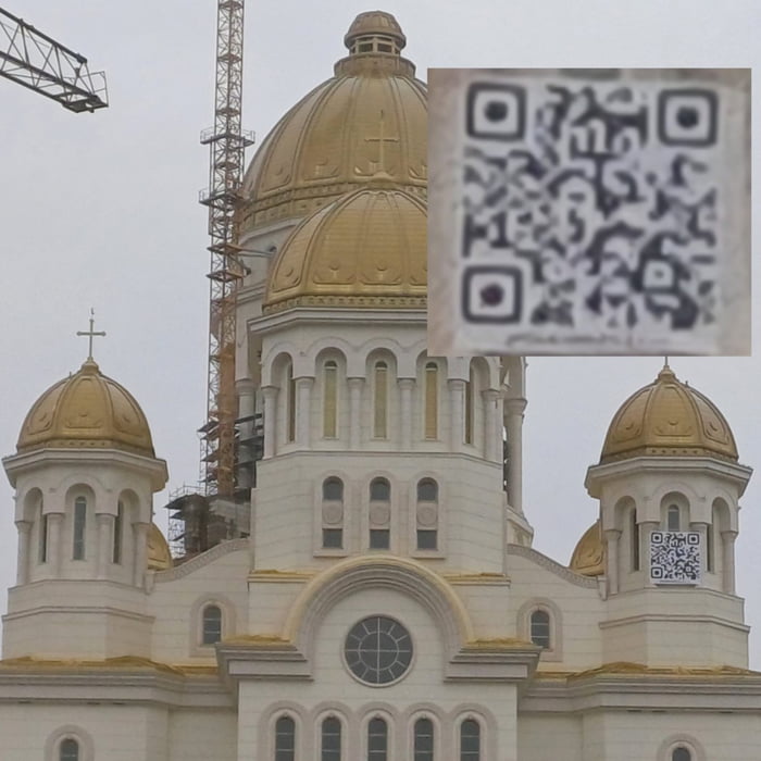 Huge QR code on Cathedral to donate more easily - 9GAG