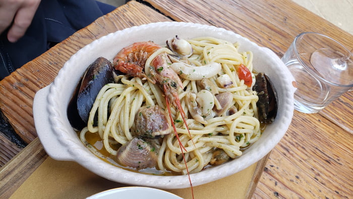 Seafood pasta from a cafe in Venice, Italy. - 9GAG