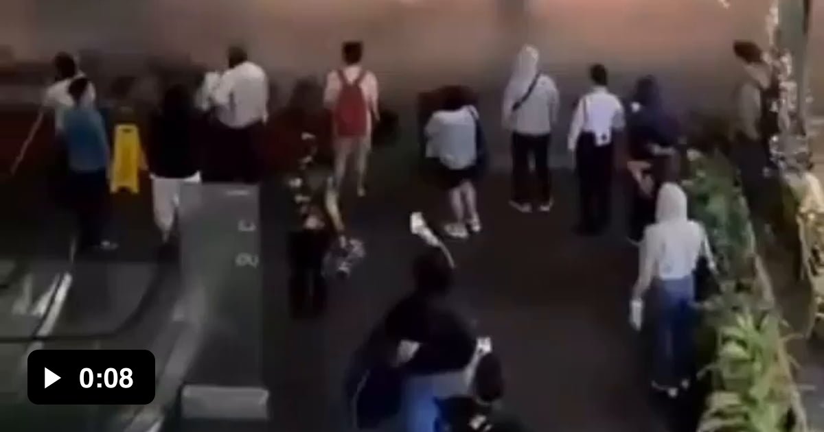 People getting dragged by strong winds in the Philippines. - 9GAG
