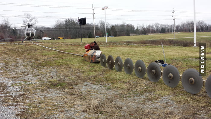 Best invention ever! A helicopter with a giant circular saw rig on a ...