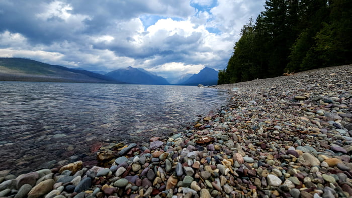 The rainbow pebble shores of a lake in Montana. - 9GAG