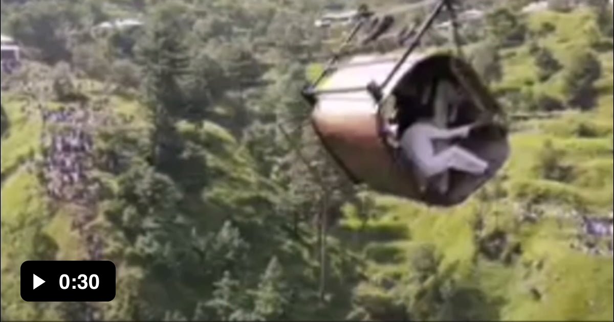Cable car dangling in Pakistan for 15 hours, visited by drone. - 9GAG